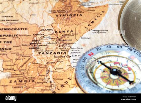 Compass On A Map Pointing At Tanzania And Kenya Planning A Travel