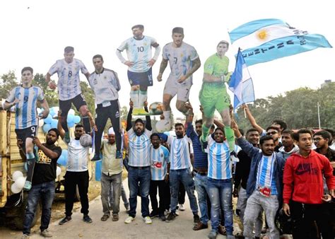Argentina Football Team Fans Hold Cut Outs Of Footballers Celebrating