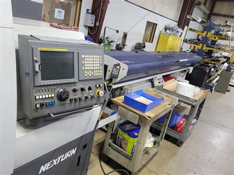 Nexturn Sa32e Cnc Swiss Lathe 2008 7 Axis Bar Feeder Fanuc Control Revelation Machinery