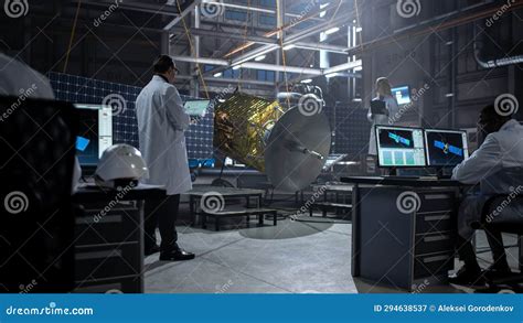 Team Of Engineers Working On Satellite Construction Aerospace Agency