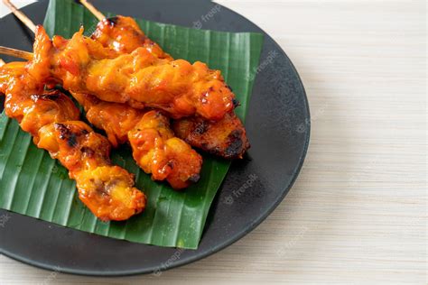 Premium Photo Grilled Chicken Skewer In Asian Style