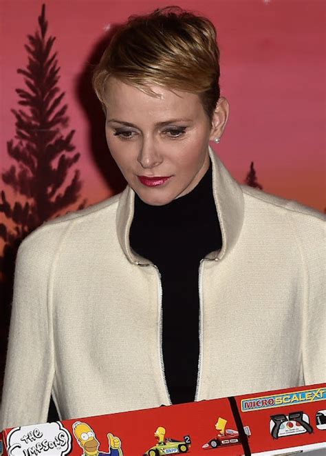 Prince Albert And Princess Charlene Attend The Christmas Ts Distribution