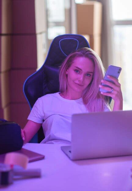 Premium Photo Young Blonde Woman Barcode Printer And Boxes On The