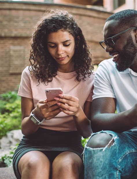 Couple In Love Using 4g Wireless Internet On Smartphone Gadgets Stock