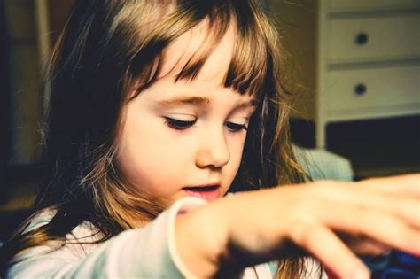 Premium Photo Close Up Portrait Of Cute Girl At Home