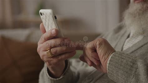 elderly man hands using smartphone extreme close up stock video video