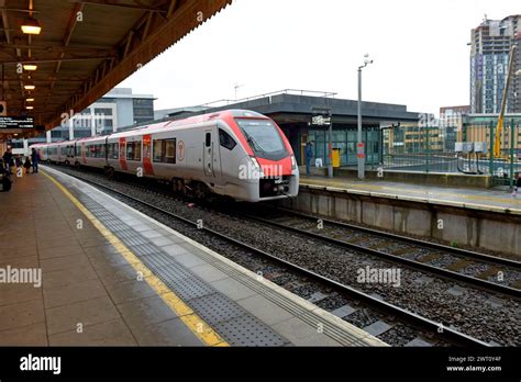 Passengers Getting On A New Transport For Wales Class 231 Stadler Flirt