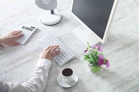 Premium Photo Girl Working On Computer At Office