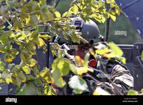 Slovenian Army Pvt Simon Ljubec Watches His Sector Of Fire While