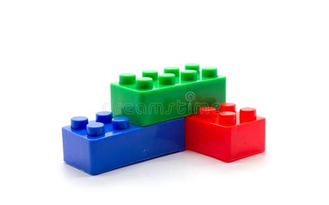 Строительные блоки Lego пластичные на белой предпосылке Стоковое