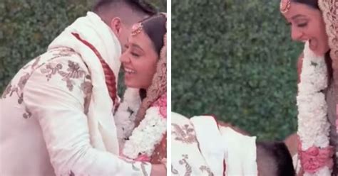 Groom Touches Brides Feet