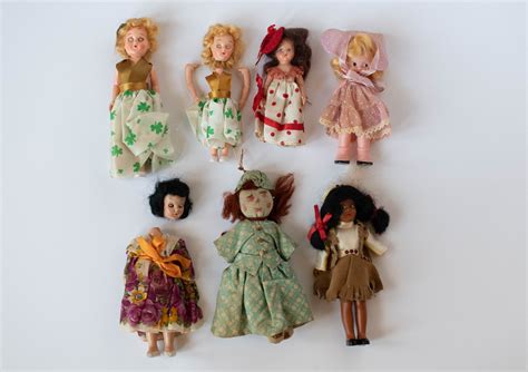 Collection Of Antique And Vintage Dolls Including Hand Made And Etsy