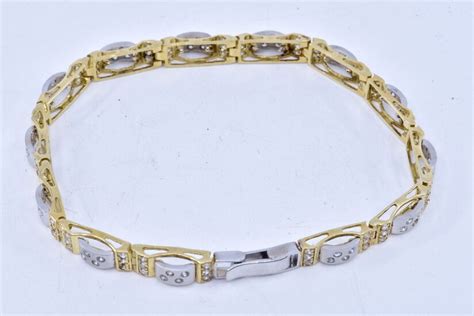 Lot Art Bracelet Articulé à Deux Tons Dor Serti De Pierres Blanches
