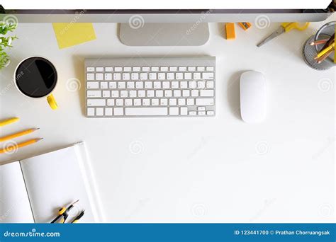 Office Desk With Computer Keyboard Smartphone Coffee Notebook And
