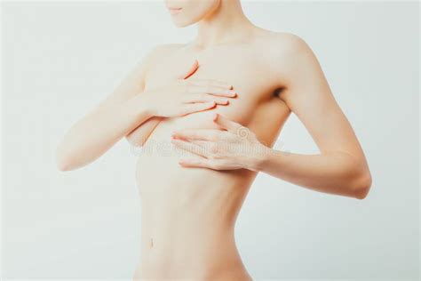 Sllender Topless Woman Checks Her Breasts Herself Palpation Detection Of Tumors Lumps