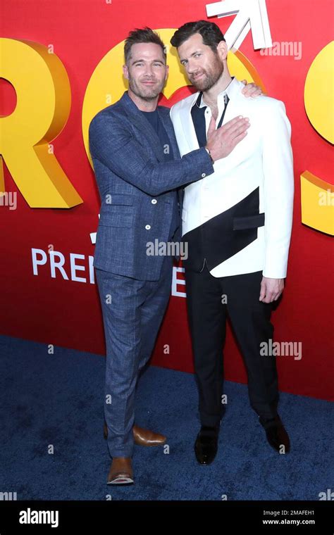 Luke Macfarlane Left And Billy Eichner Attend The Premiere Of Bros