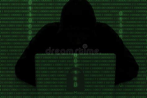 Hacker Wearing A Hooded Top Using Laptop Computer In The Dark T Stock Image Image Of Infect