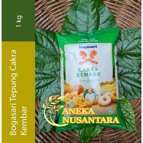 Jual Tepung Terigu Cakra Kembar PREMIUM 1 Kg Bogasari Protein