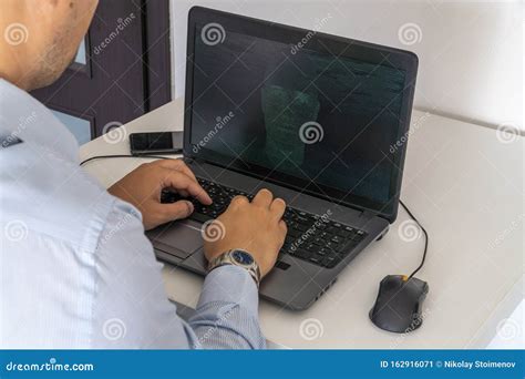 Hacker Creating An Aricial Intelligence Software Program Stock Image