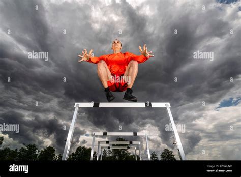 Man Jumping Hurdle Hi Res Stock Photography And Images Alamy
