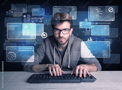 nerd with glasses hacking websites stock foto adobe stock