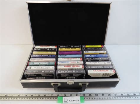 24 Cassettes In Case Bodnarus Auctioneering