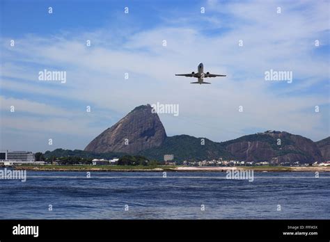 Airplane Landing At The Airport Aeroporto Santos Dumont Rio De Janeiro Brazil In The