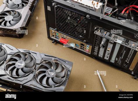 Graphics Card Upgrading Concept Two Gaming Graphics Cards Near Desktop