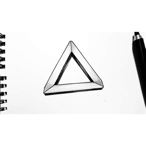 A Triangle Is Drawn On A Notebook With A Pen Premium AI Generated Image
