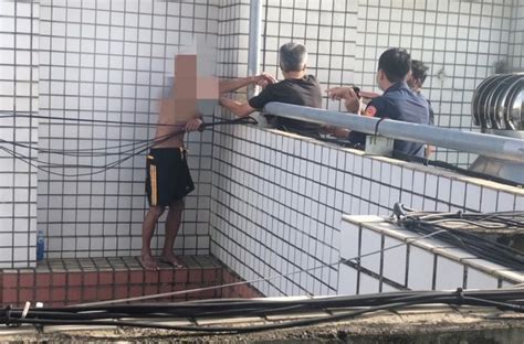 警頂烈日開導頂樓輕生男 警消聯手鬼門關救回