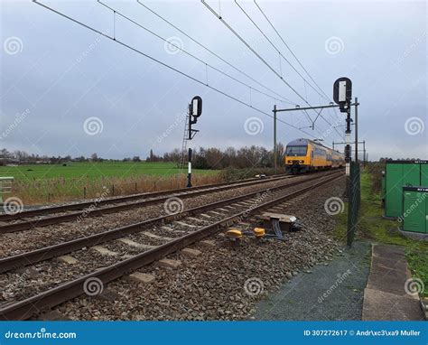 Ddaz Double Deck Intercity Train On Railroad Track Editorial