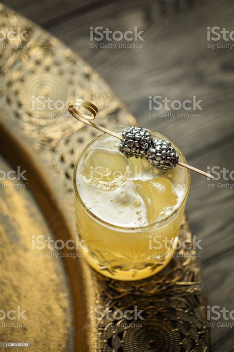 White Russian Cocktail And White Background Offee Liquor Pouring Into