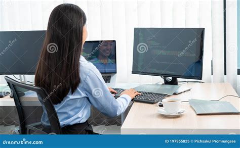 Asian Woman Programming Working With Computer And Typing Data Code To Developing Program At