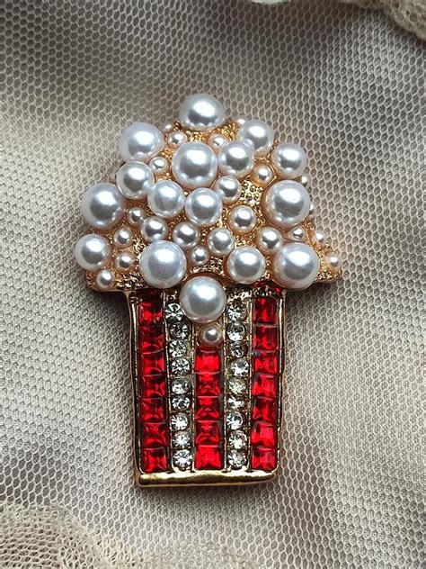 Брошка попкорн — ціна 160 грн у каталозі Брошки Купити аксесуари за доступною ціною на Шафі