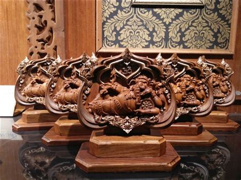 ไม้แกะสลักพระพิฆเนศ ปางเสวยสุข โดยของหายาก ทำมือ อ เชียงคำ จ พะเยา รหัสสินค้า 306628