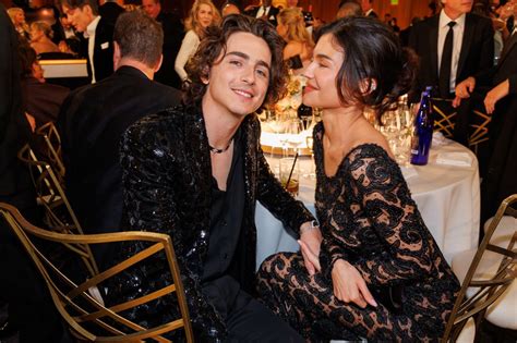 Kylie Jenner glows as she kisses Timothée Chalamet in rare loved up