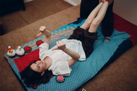 Premium Photo Thai Man Making Classical Thai Massage Procedure To Young Woman At Beauty Spa