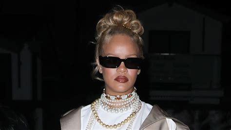 Rihanna Looks Unrecognizable As She Drips In Pearls And Debuts Punky