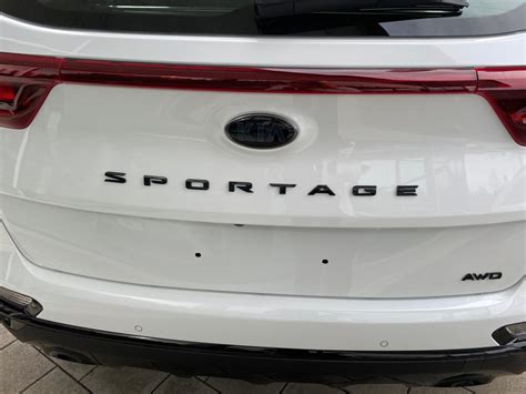 KIA emblem Sportage logo till bilen, svart och silver