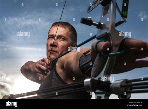Man Aiming Bow Arrow Man Stock Photos Man Aiming Bow Arrow Man Stock Images Page Alamy