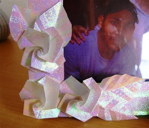 Origami Maniacs Decorating A Picture Frame With Origami Flowers