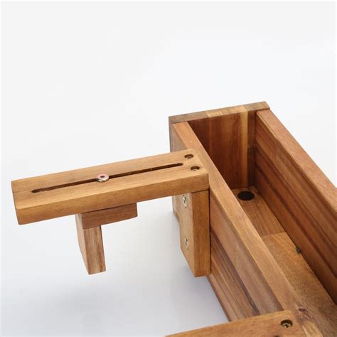 The Acacia Deck Rail Planter Hammacher Schlemmer