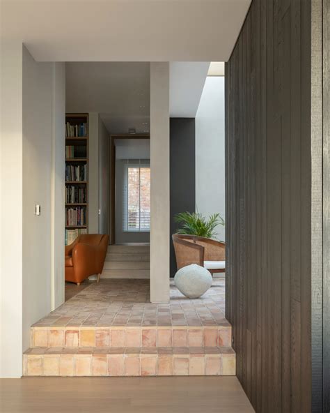 Linear Brick Wall Conceals Earthy And Tactile Interiors Of Devon Passivhaus