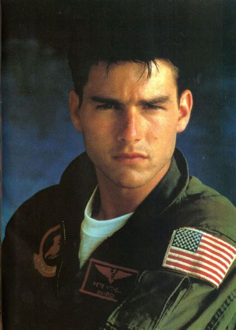 A Man In An Air Force Uniform Is Looking At The Camera