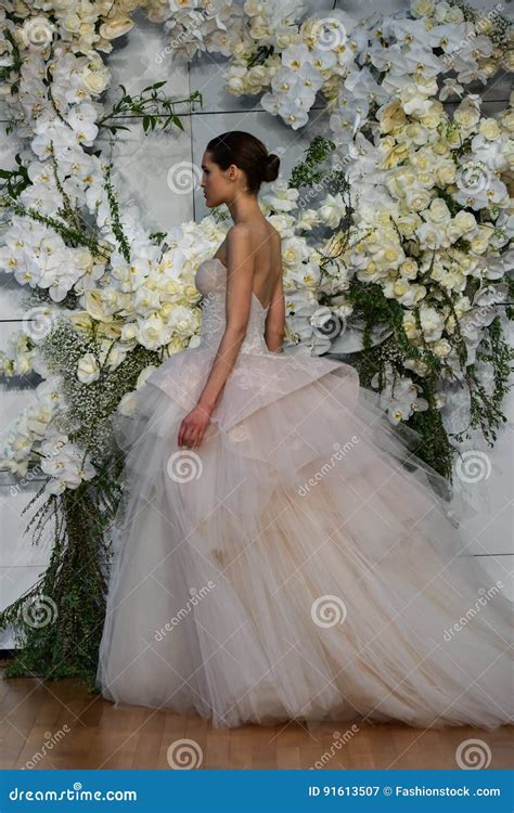 A Model Walks The Runway At The Monique Lhuillier Spring 2018 Bridal