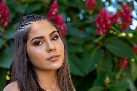 Premium Photo Beautiful Brunette Girl Posing On Photos In Nature