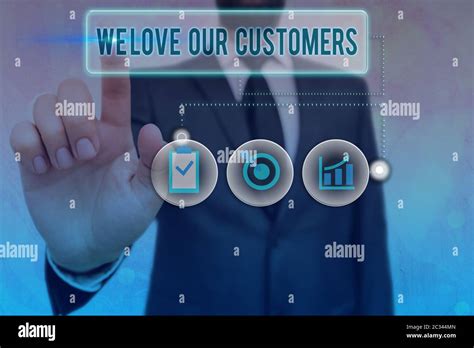 Writing Note Showing We Love Our Customers Business Concept For Clients Care And Attention Good