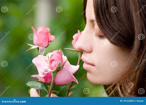 Girl Smelling Flowers Stock Image Image Of Smiling Carefree 10122009