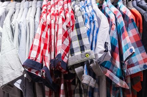 Premium Photo Male Clothes On Open Clothes Rail