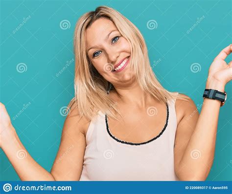 Middle Age Caucasian Woman Wearing Casual Clothes Dancing Happy And